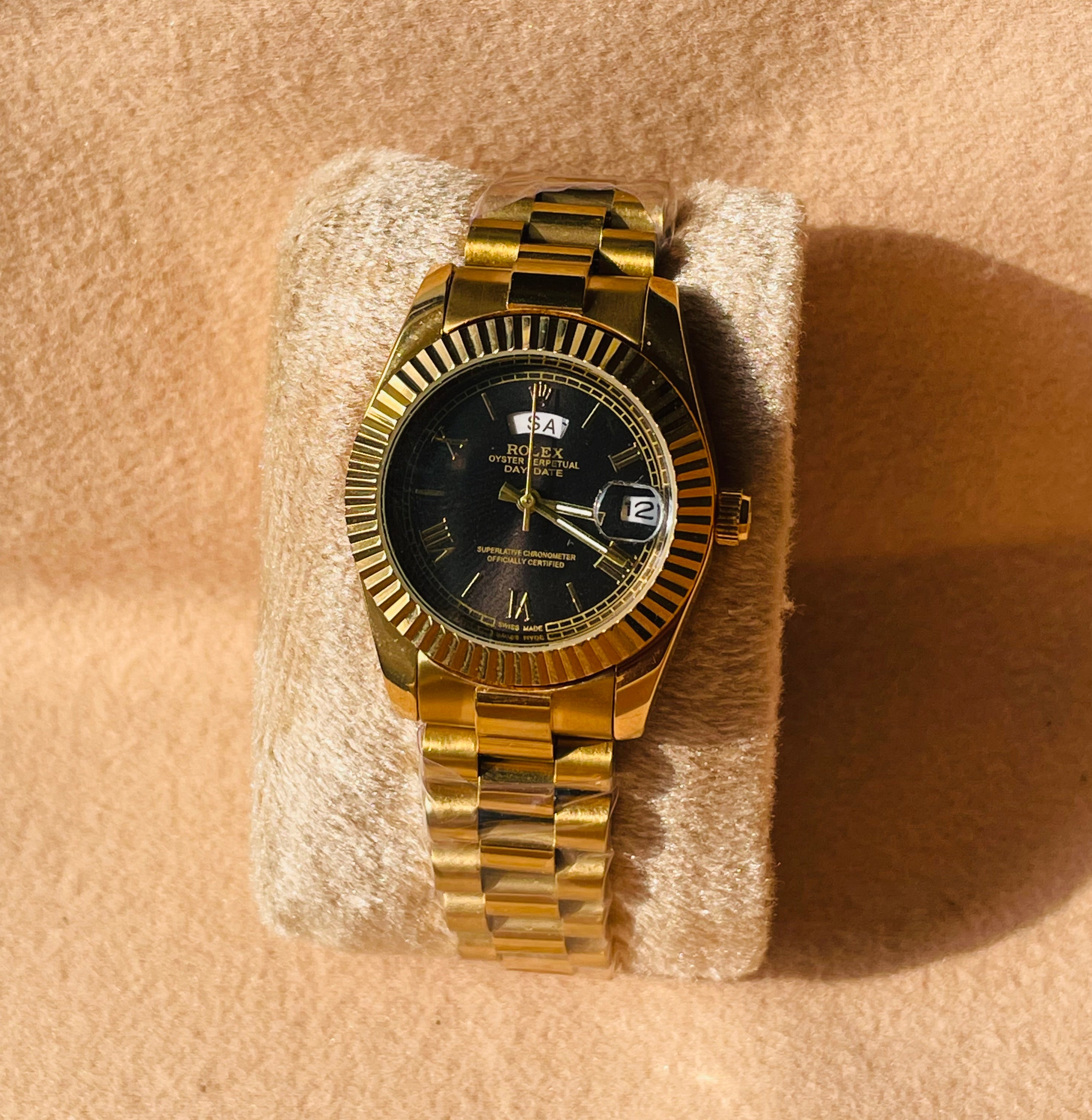 Perpetual Gold Braided Black Roman Dial Rlx DayDate Watch – Aliyar Zaviyar